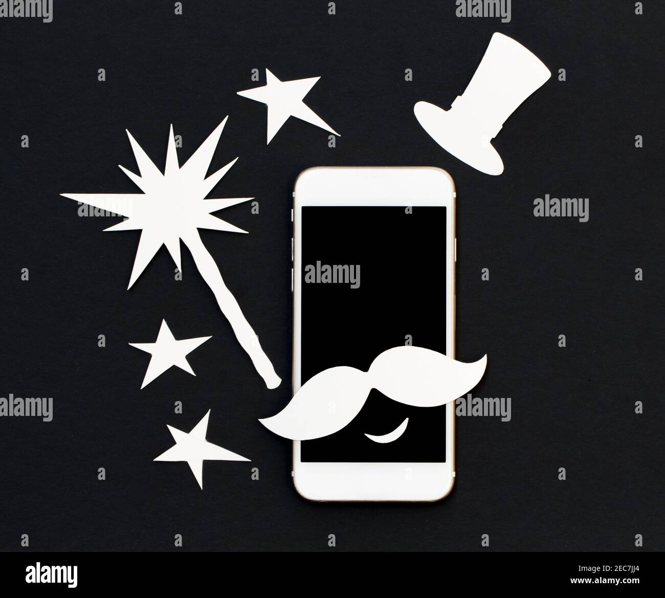 White phone in paper cut collage with magic wand and stars. Smartphone ...