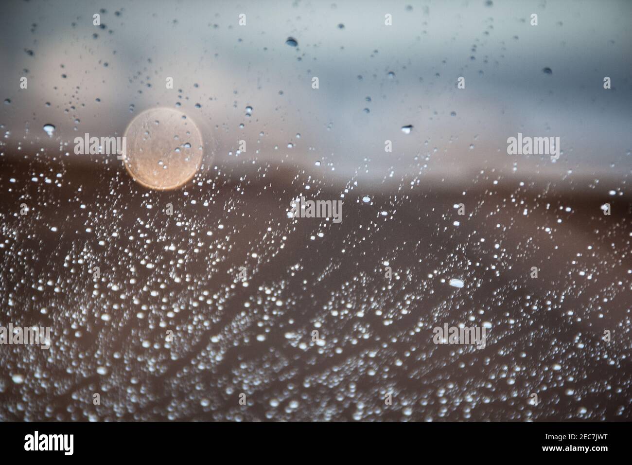 Light flare through the rain Stock Photo - Alamy
