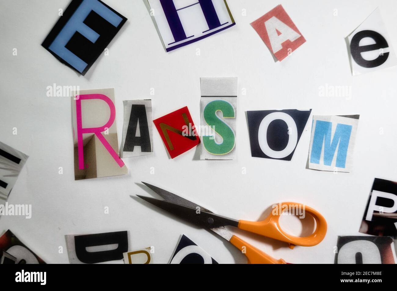 The word Ransom using cut-out paper letters in the ransom note effect ...