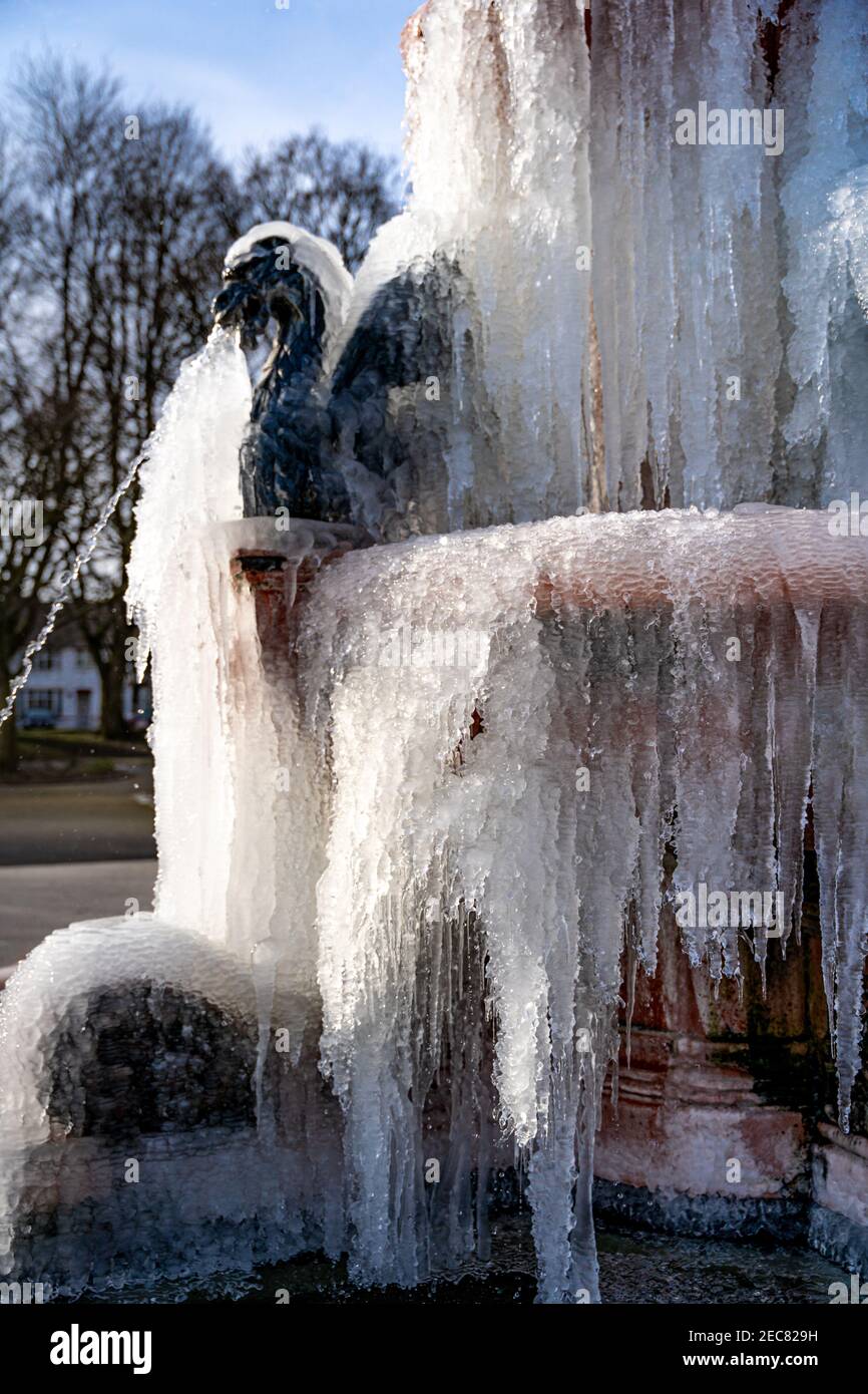 A frozen Victorian fountain in Hanley Park, featuring a sculpture of a ...