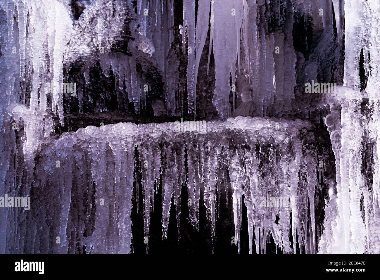 A frozen victorian fountain with large icicles, in Hanley Park, Stoke ...