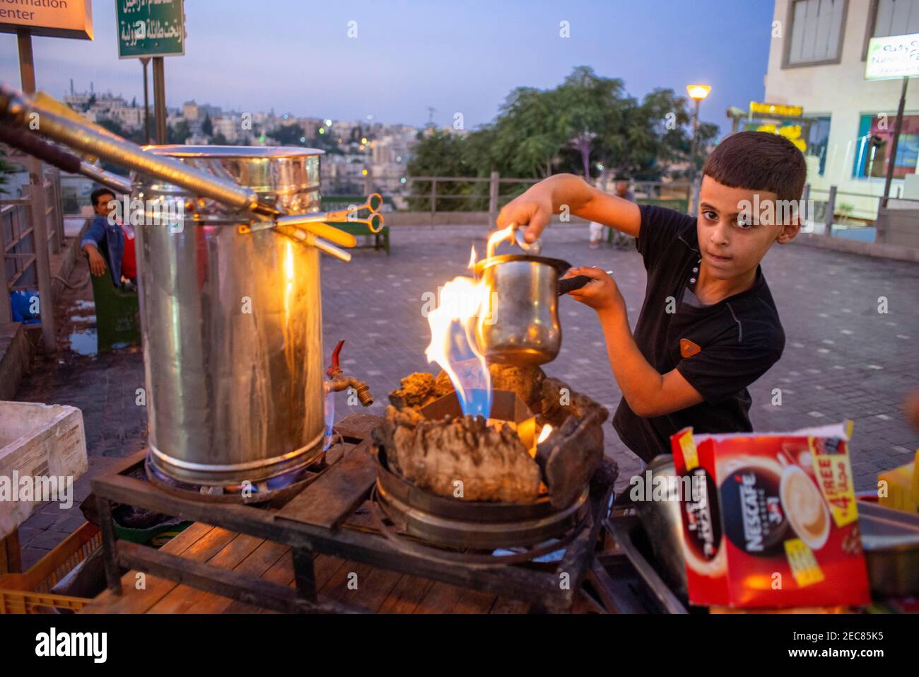 Tea and coffee street young vendor in Rainbow street fashion Jabal ...