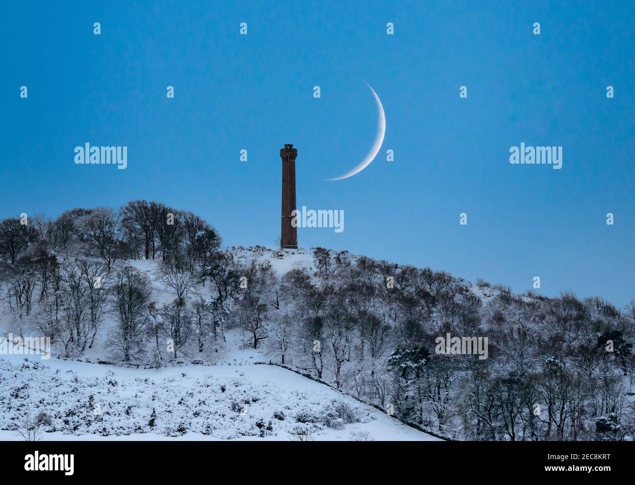 Victorian hilltop Hopetoun monument on snow covered hill in Winter with ...