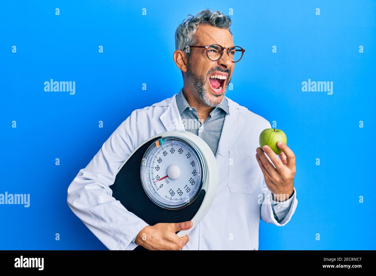 Strong man weighing scale hi-res stock photography and images - Alamy