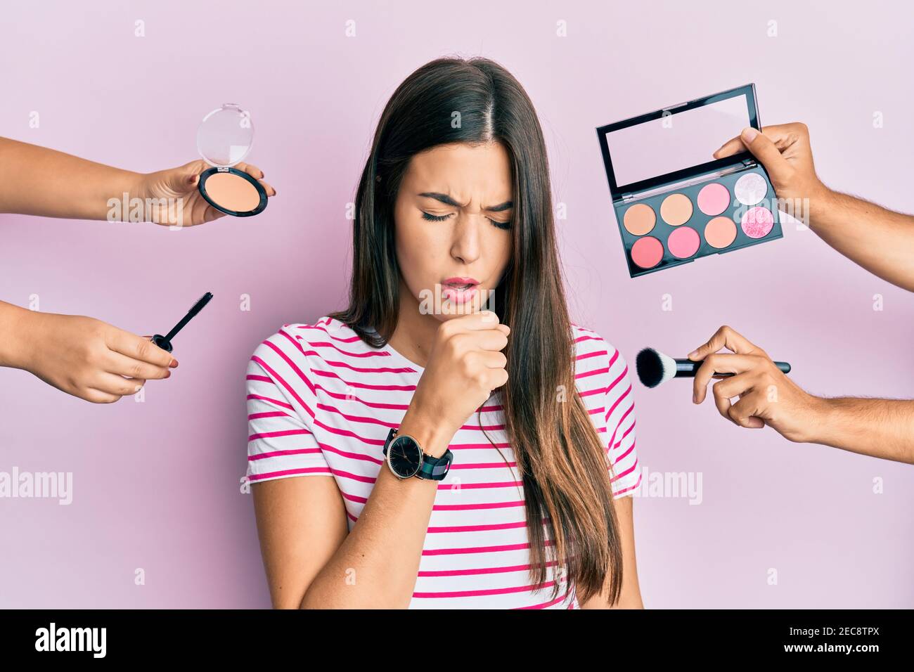 Young brunette woman with make up cosmetic around feeling unwell and ...