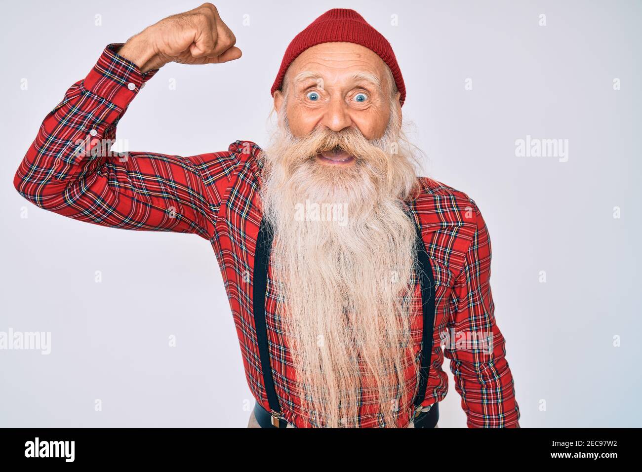 Old senior man with grey hair and long beard wearing hipster look with ...