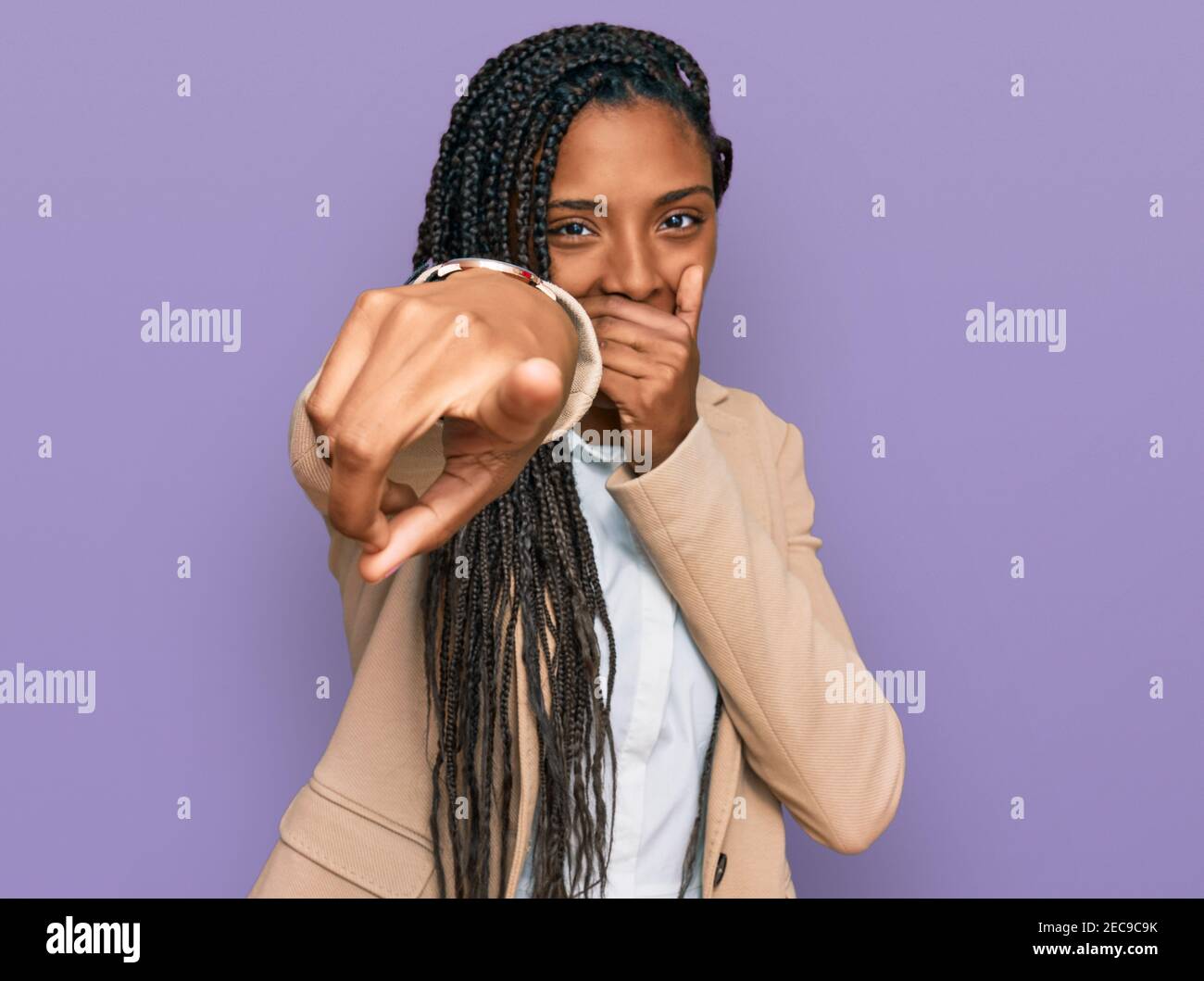 African american woman wearing business jacket laughing at you ...