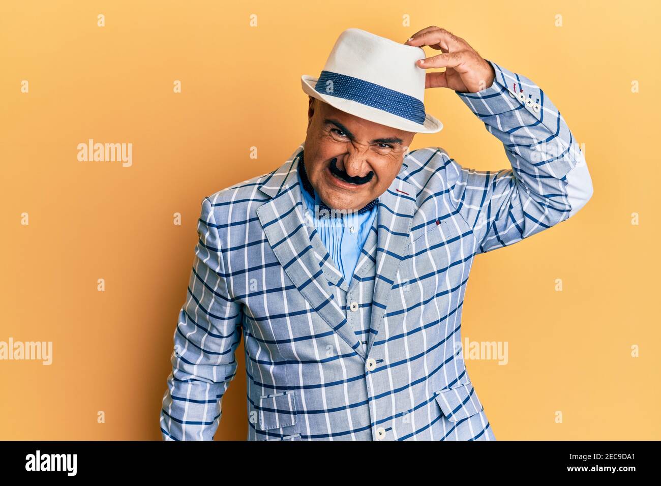 Mature middle east man with mustache wearing vintage and elegant ...