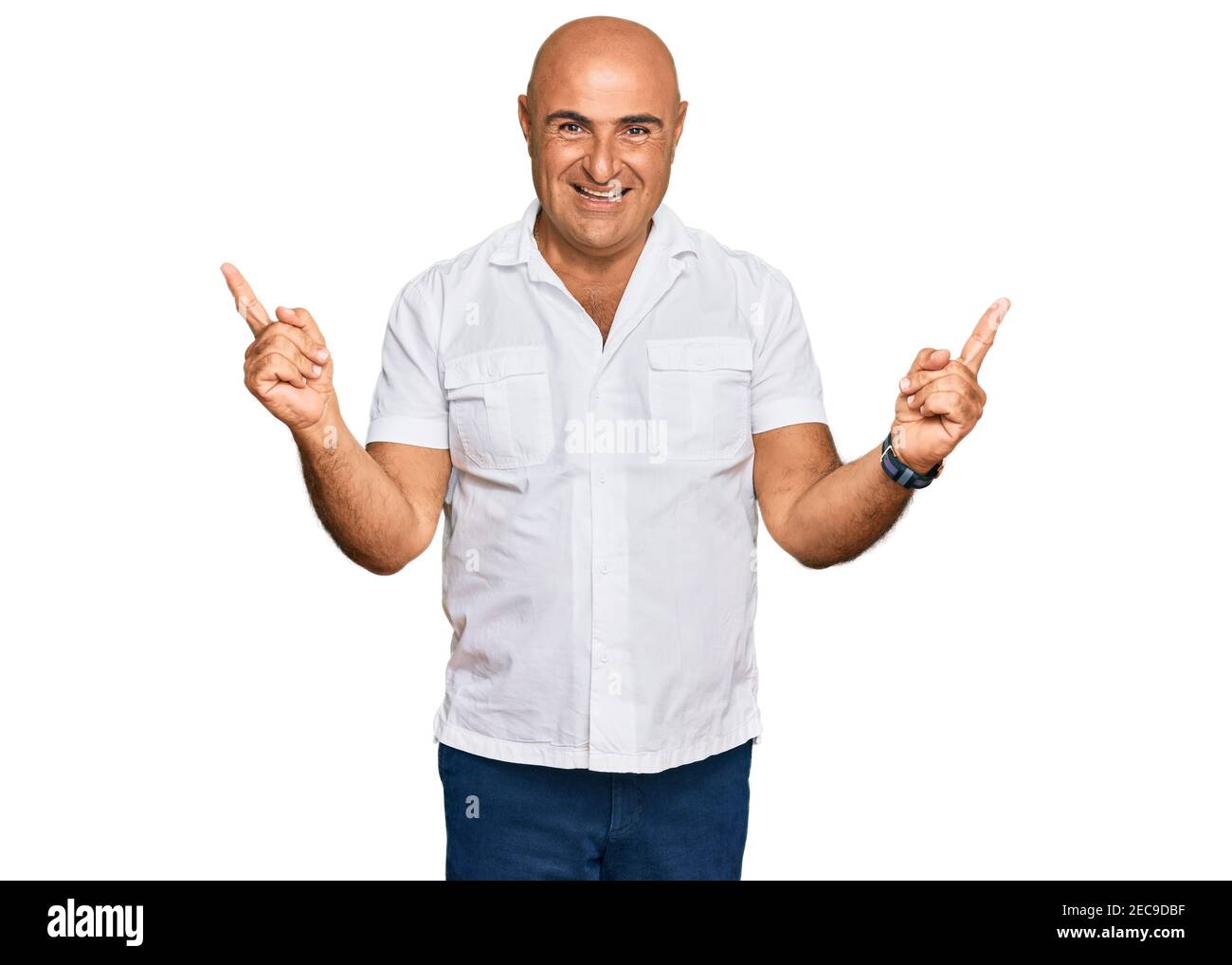 Mature middle east man with mustache wearing casual white shirt smiling ...