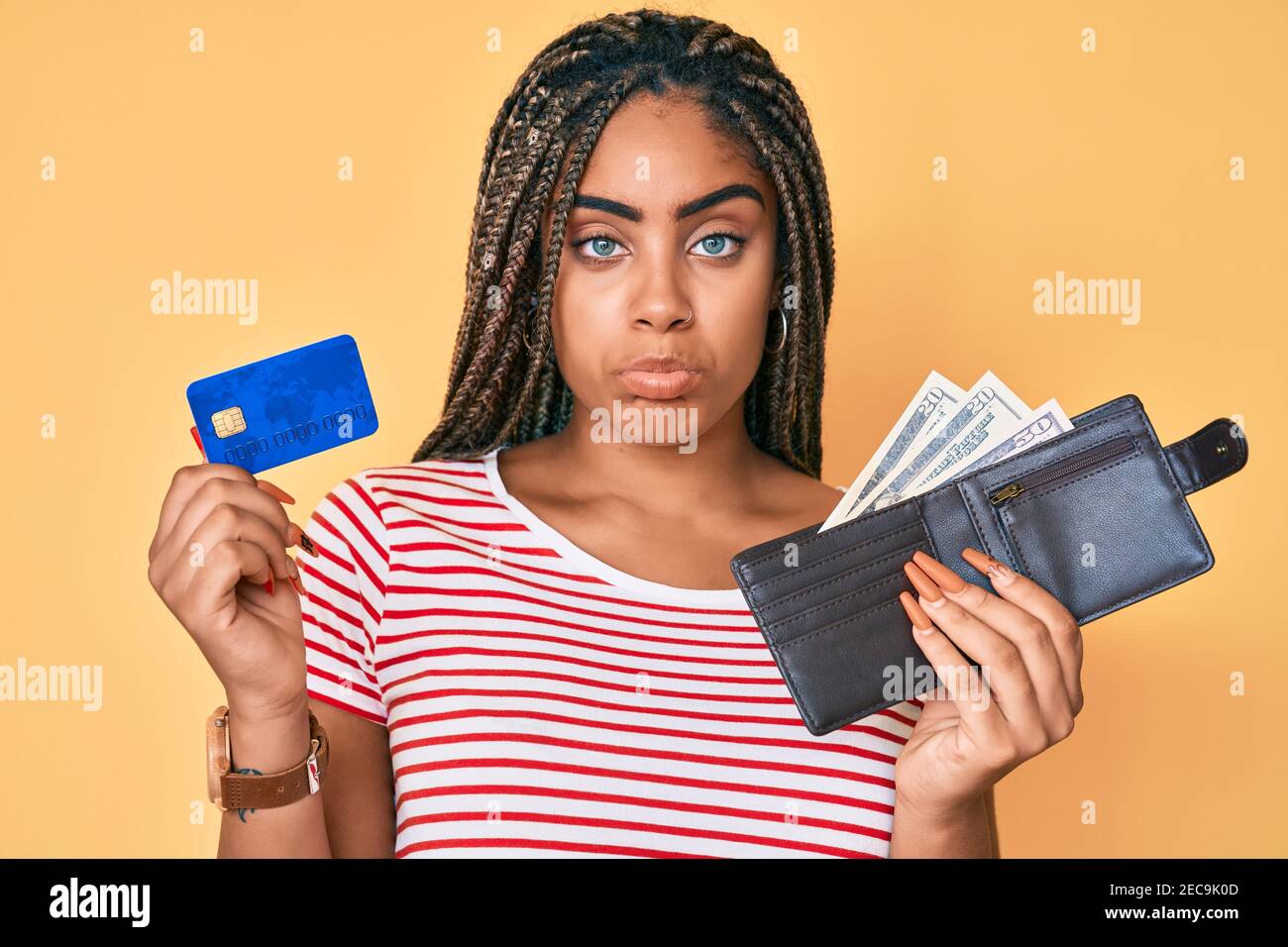 Bank card black woman worry hi-res stock photography and images - Alamy
