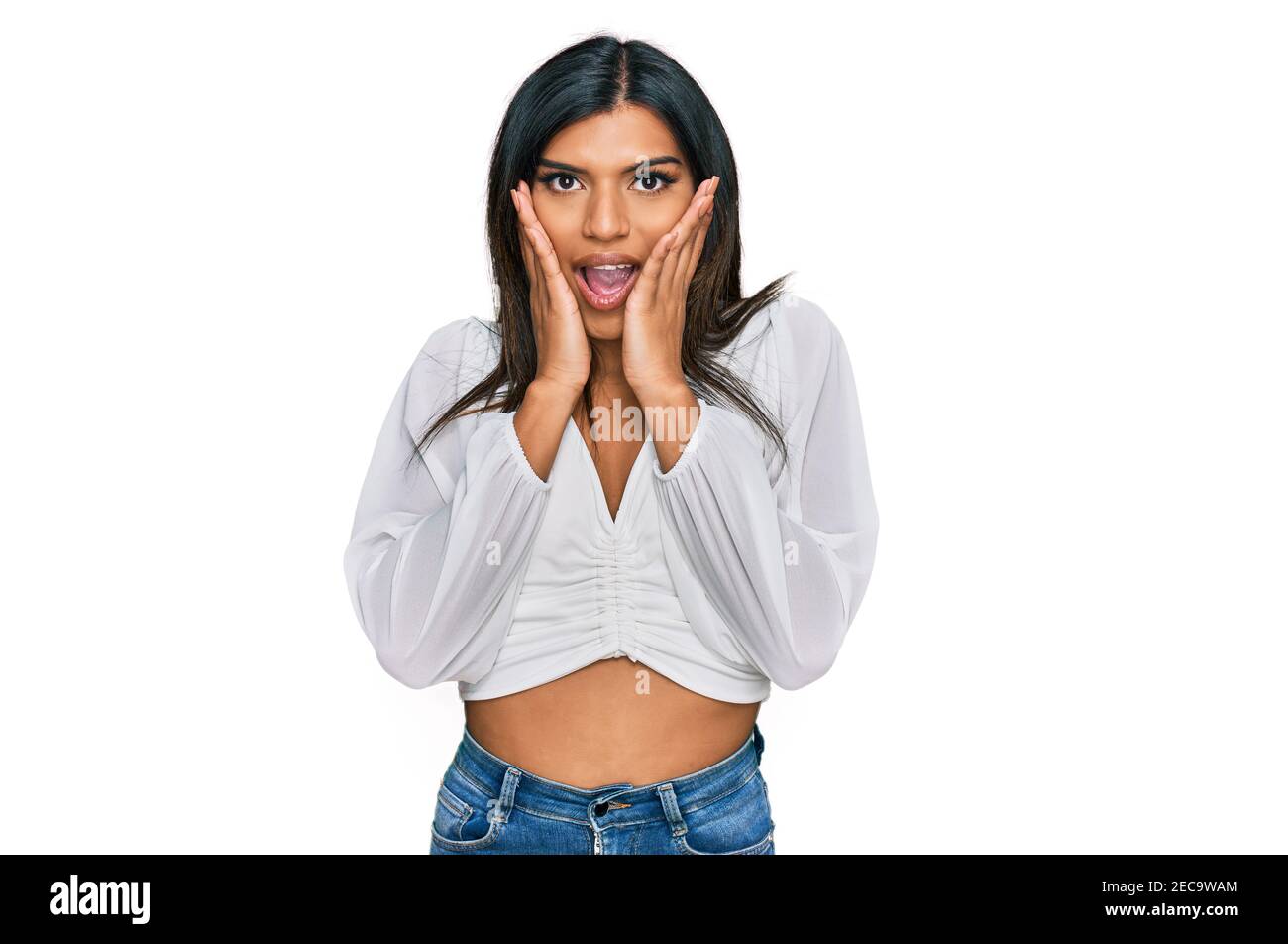 Young latin transsexual transgender woman wearing casual clothes afraid ...