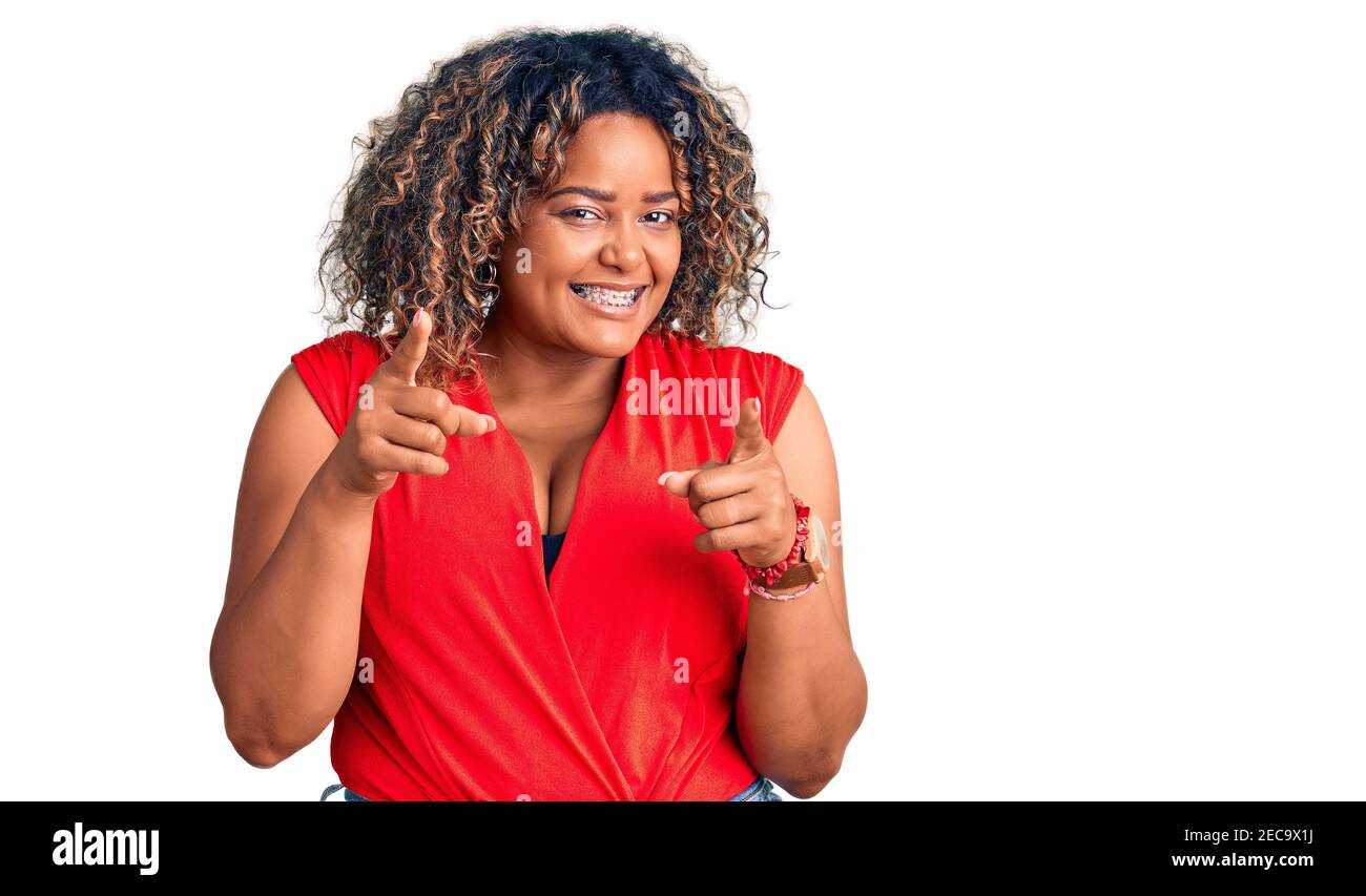 Young african american plus size woman wearing casual style with ...