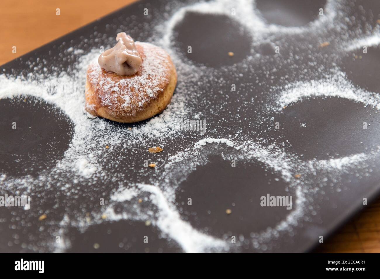 The last cookie on a tray Stock Photo - Alamy