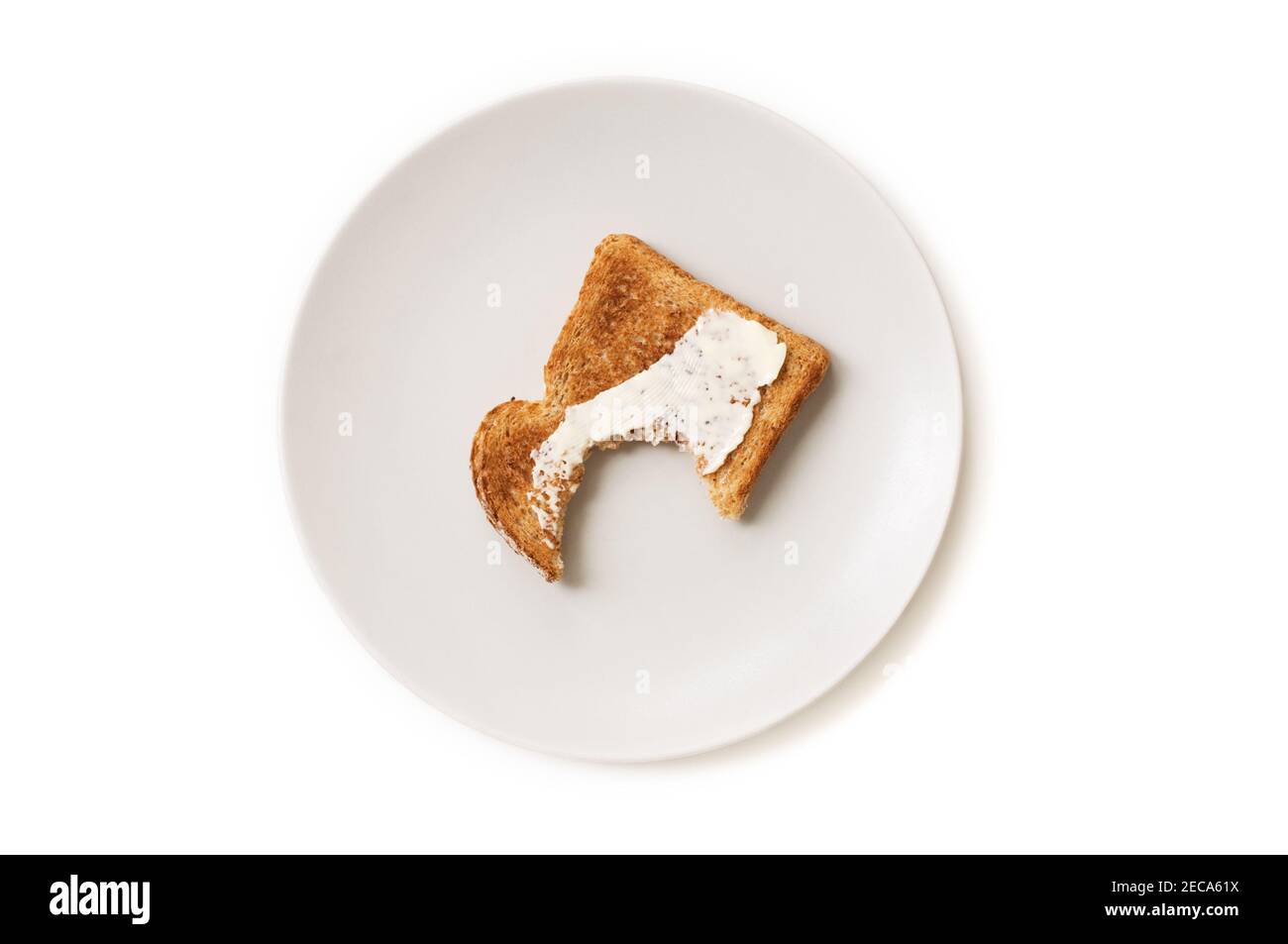 Breakfast toast with a bite taken out Stock Photo - Alamy
