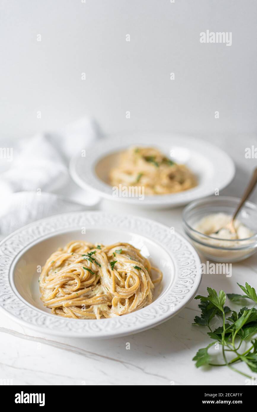 Cheesy Spaghetti Pasta, Zucchini and Parmesan Stock Photo - Alamy