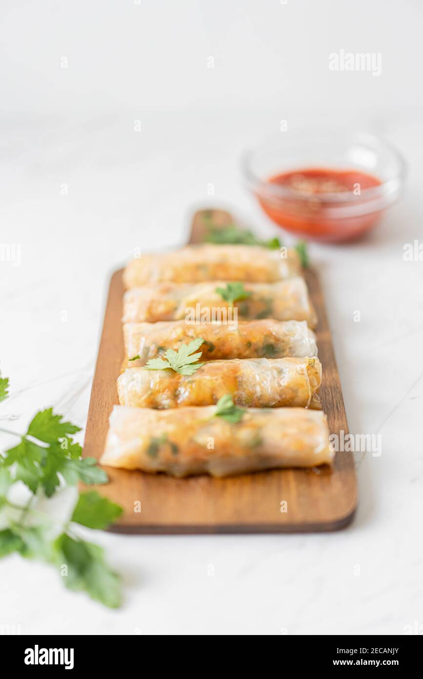 Dip appetizer spring rolls hi-res stock photography and images - Alamy