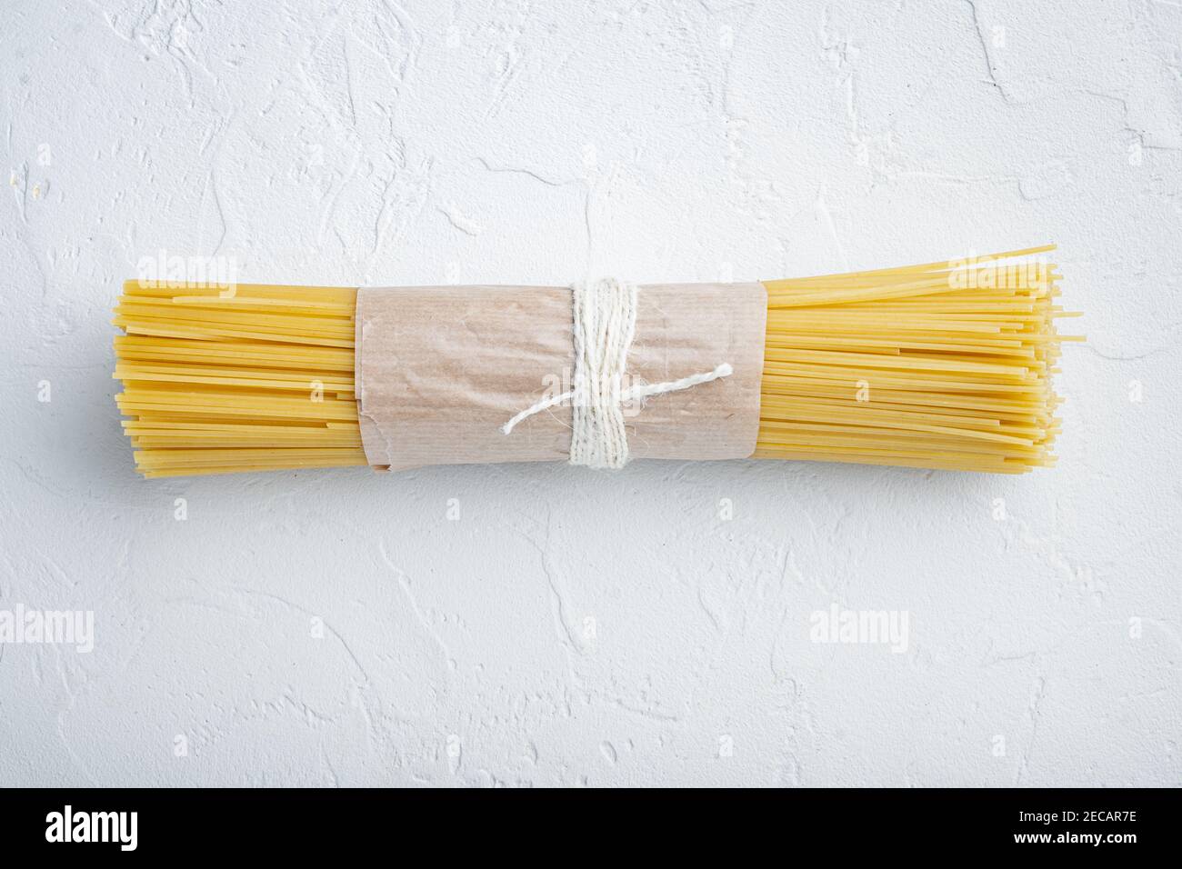 Long spaghetti. Raw spaghetti set, on white background, top view flat ...