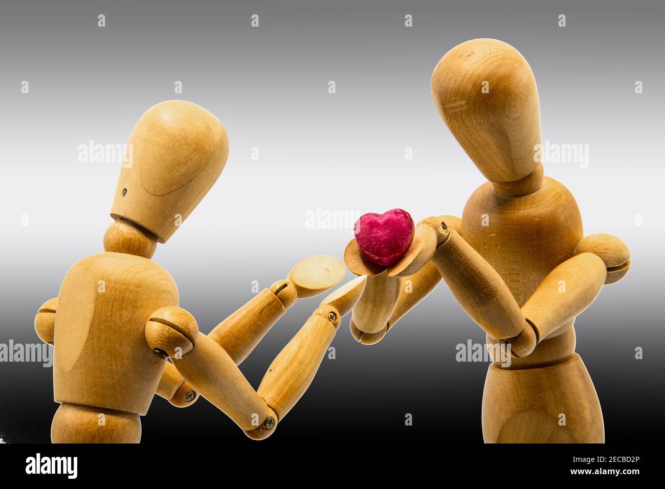 Drawing doll with a heart in the hands offering its heart with love ...