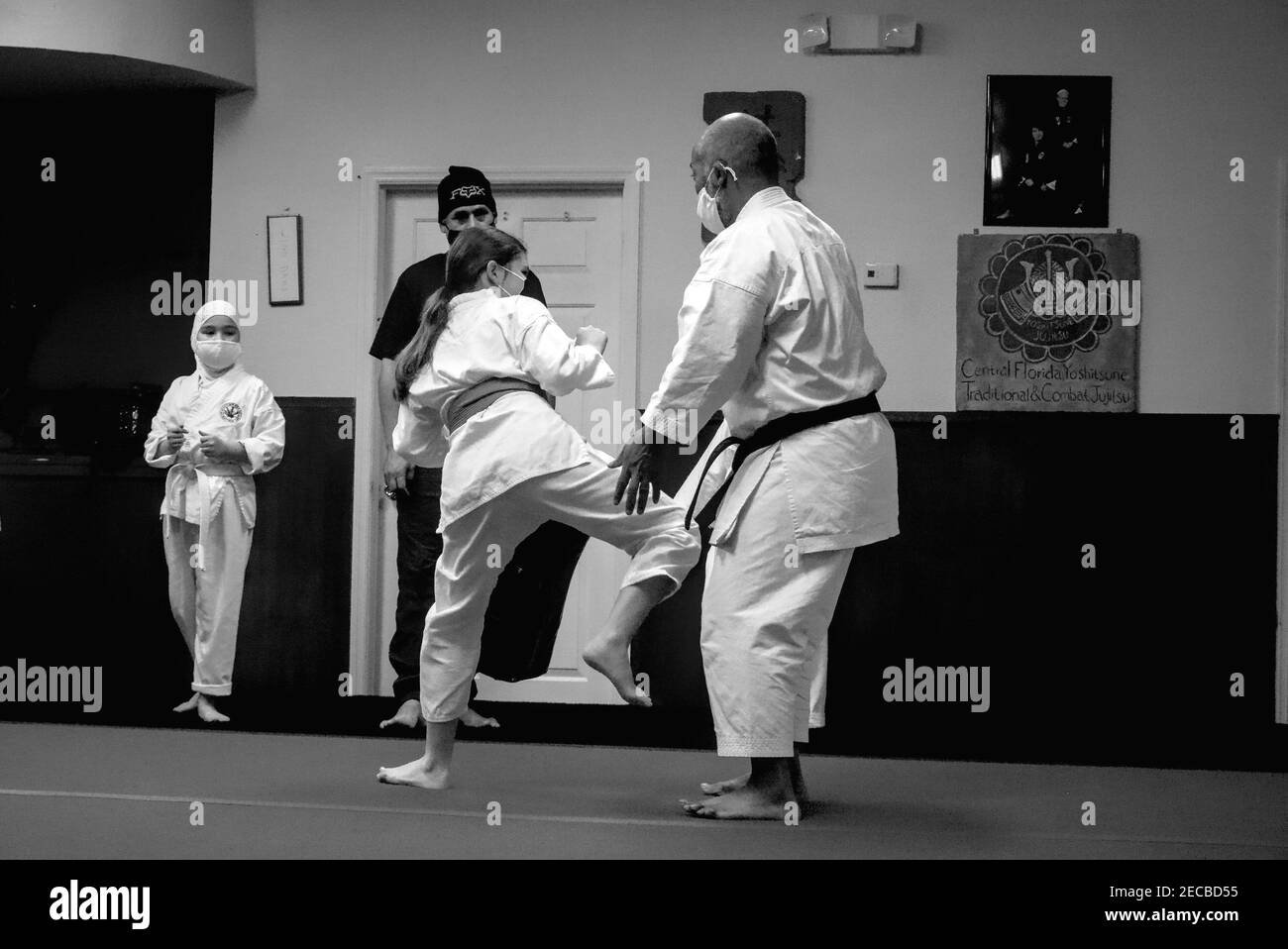 This action photo is of my daughter and her classmates in a Karate ...