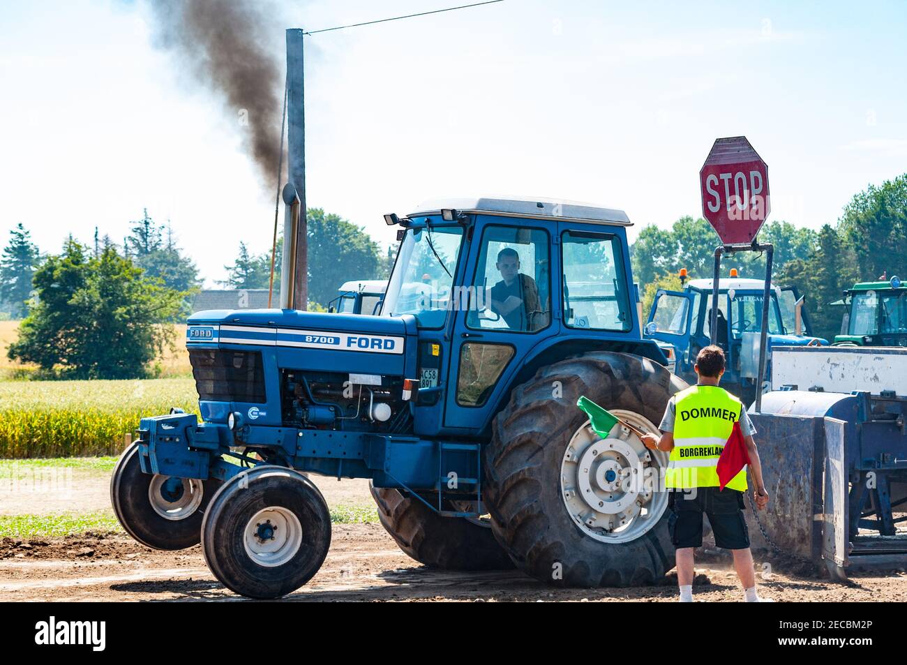 Blue tractor smoke hi-res stock photography and images - Alamy