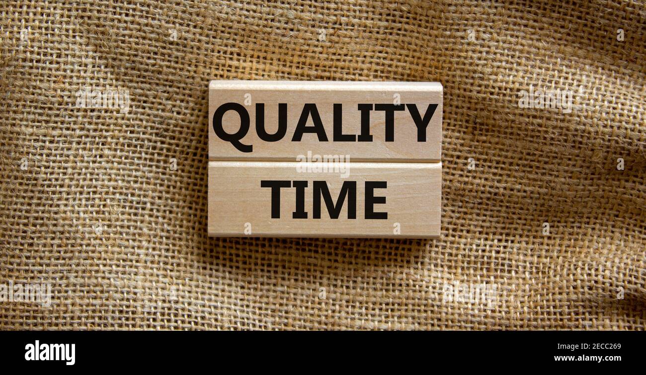 Quality time symbol. Wooden blocks with words 'quality time'. Beautiful ...