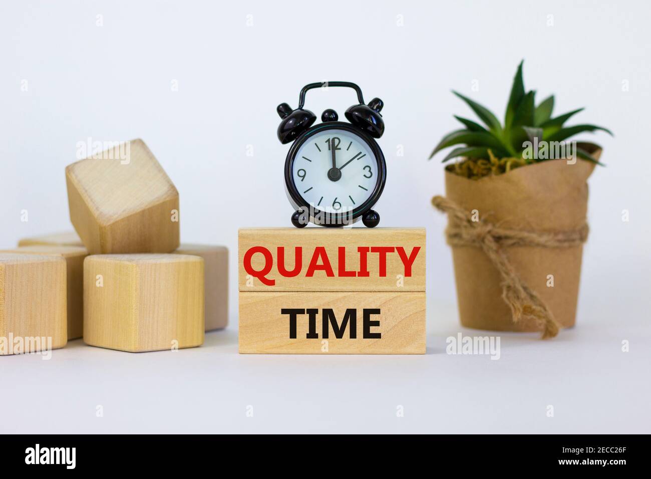 Quality time symbol. Concept words quality time on wooden blocks on a ...