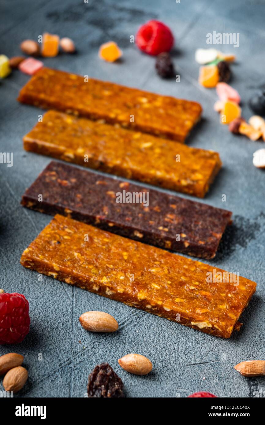 Fruit berry nut energy bars, healthy snack, on grey background Stock ...