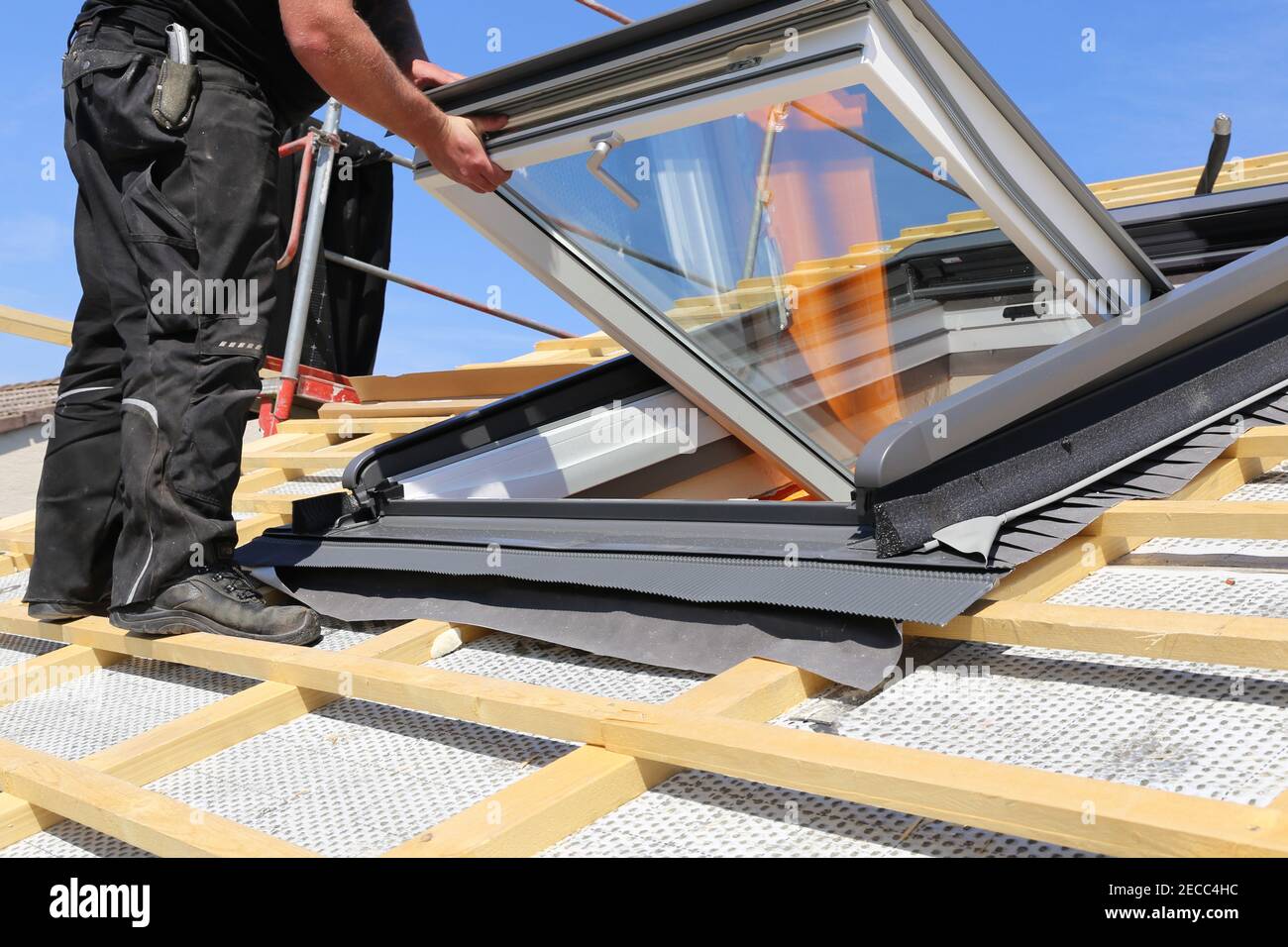 Installation and assembly of new roof windows as part of a roof ...