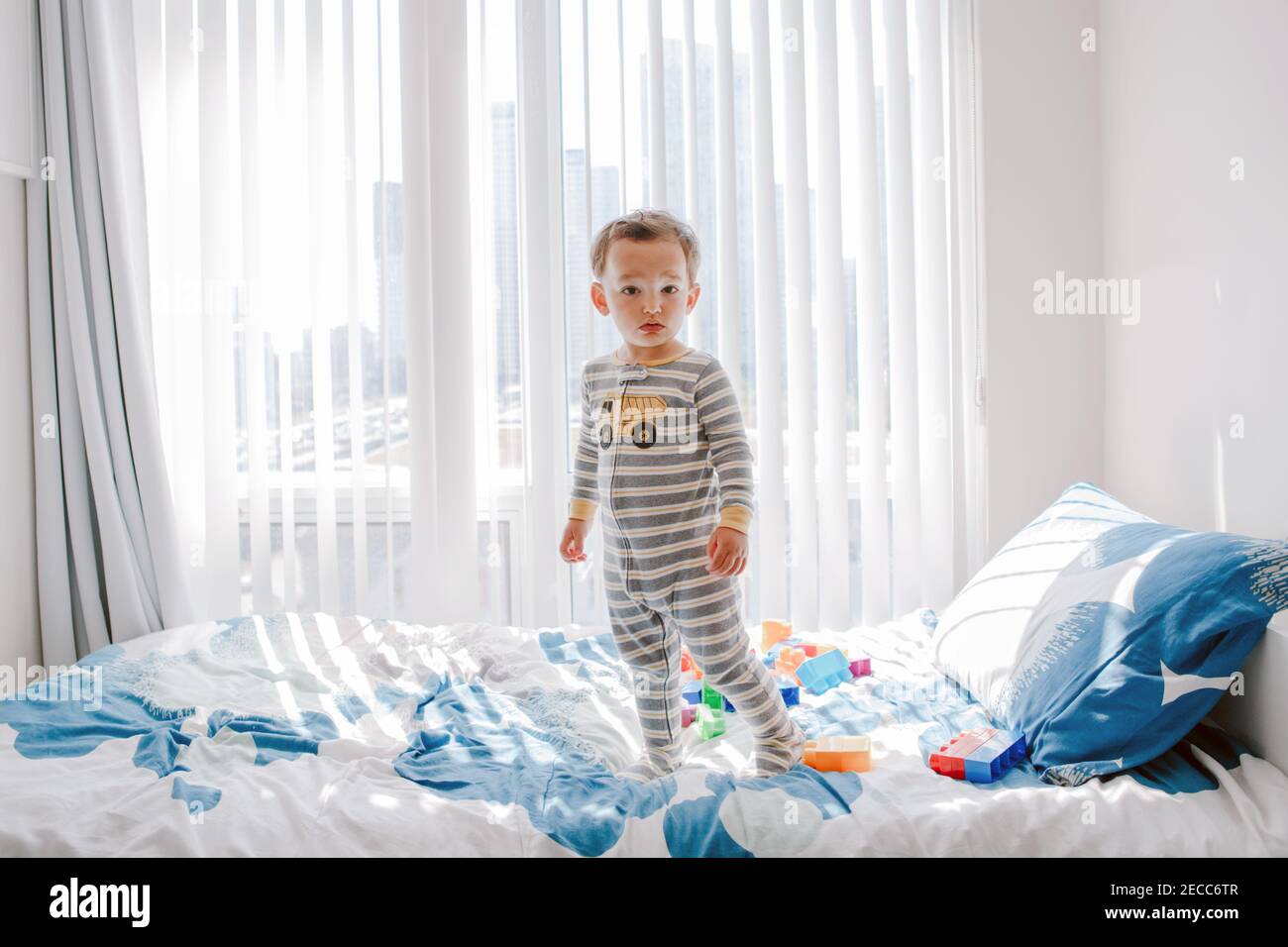 Child boy looking at camera staring hi-res stock photography and images ...