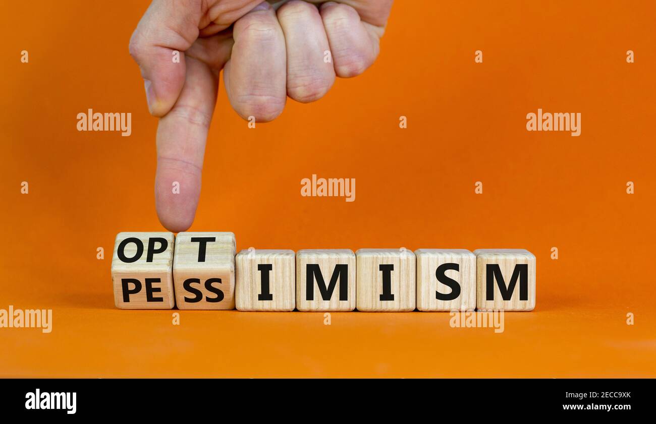 Pessimism or optimism symbol. Businessman turns cubes and changes the ...