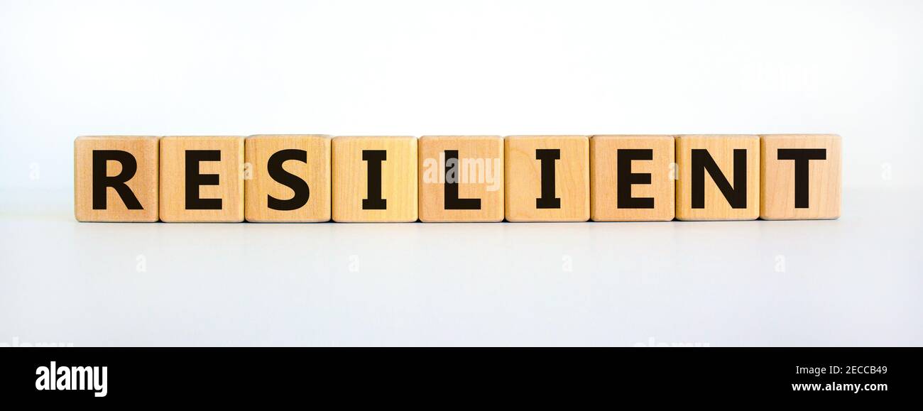 Resilient symbol. Wooden cubes with the word 'resilient'. Beautiful ...