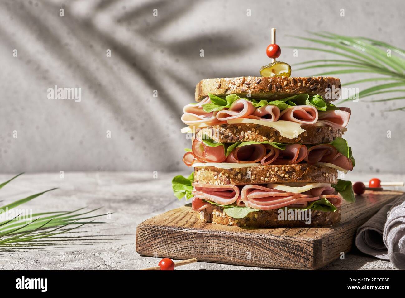Fresh club sandwich with ham and cheese Stock Photo - Alamy