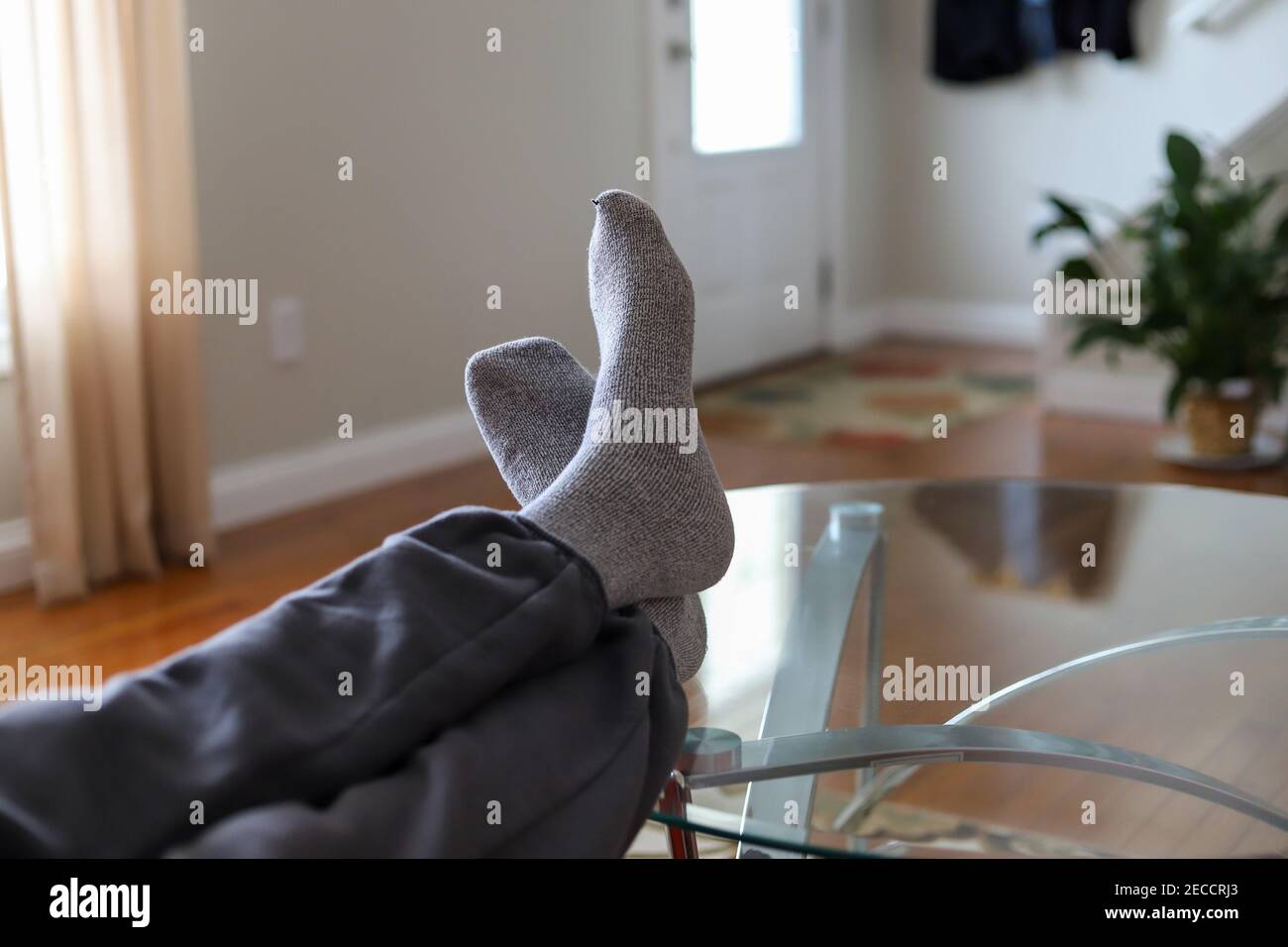 Man Sitting With Feet Up On Table High Resolution Stock Photography and ...