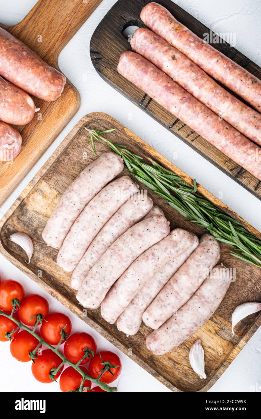 Raw sausages set, top view, on white background Stock Photo - Alamy