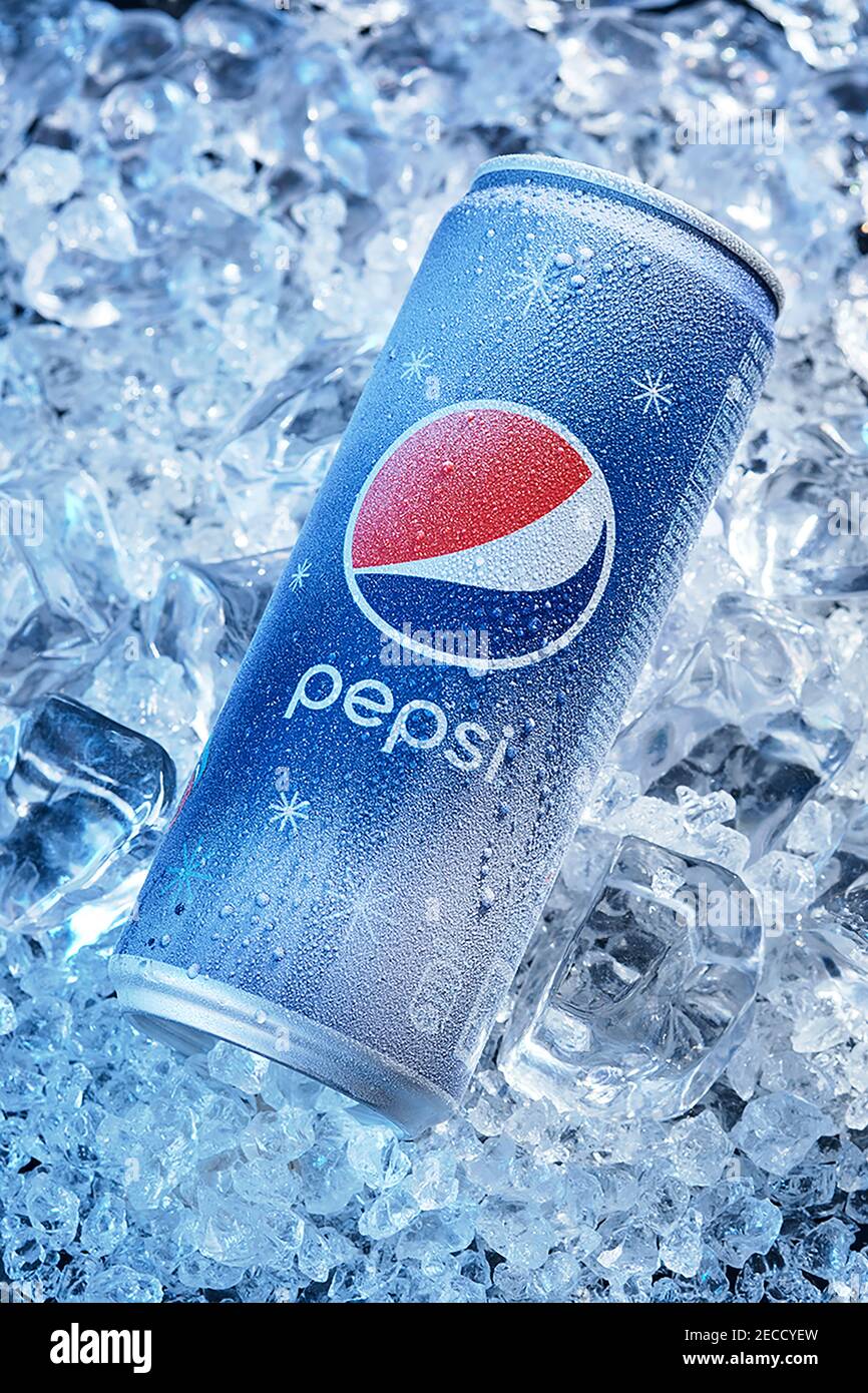 MOGILEV, BELARUS FEBRUARY 13 2021: Can of Pepsi cola on ice over black ...