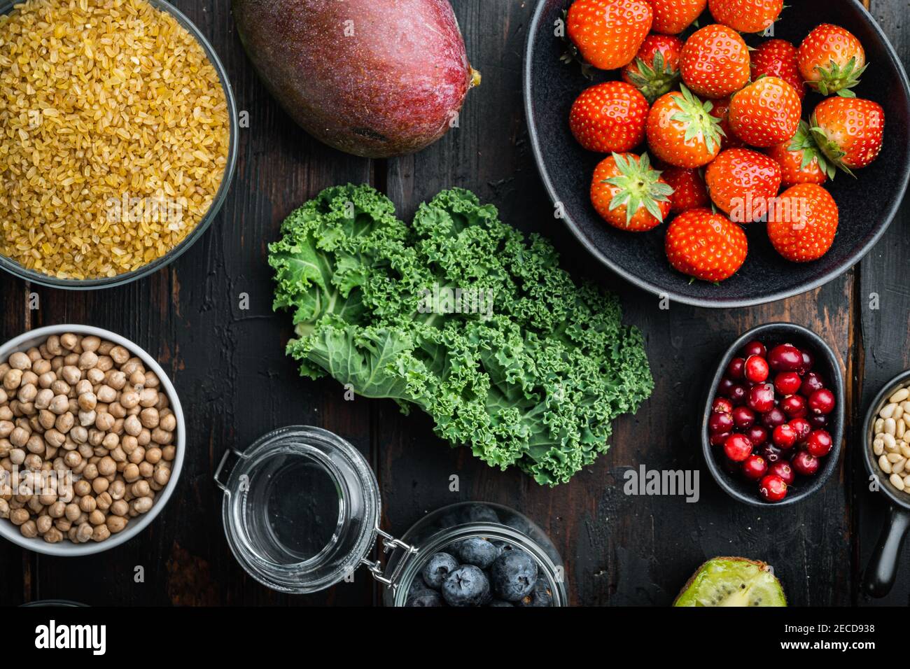 Healthy products with immunity boosters, flat lay on dark wooden ...