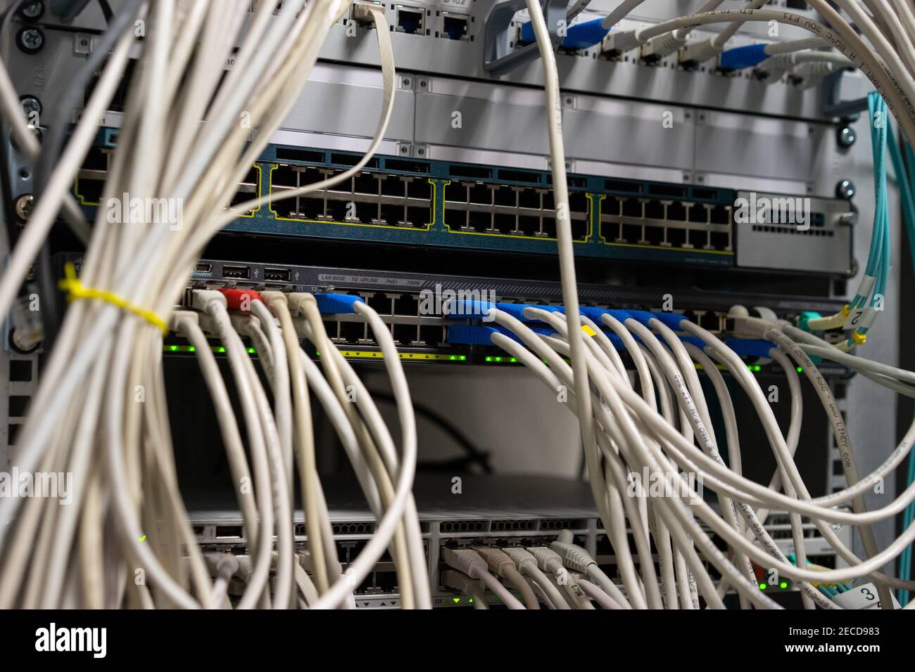 Network cable and switch, data center in server room Stock Photo - Alamy