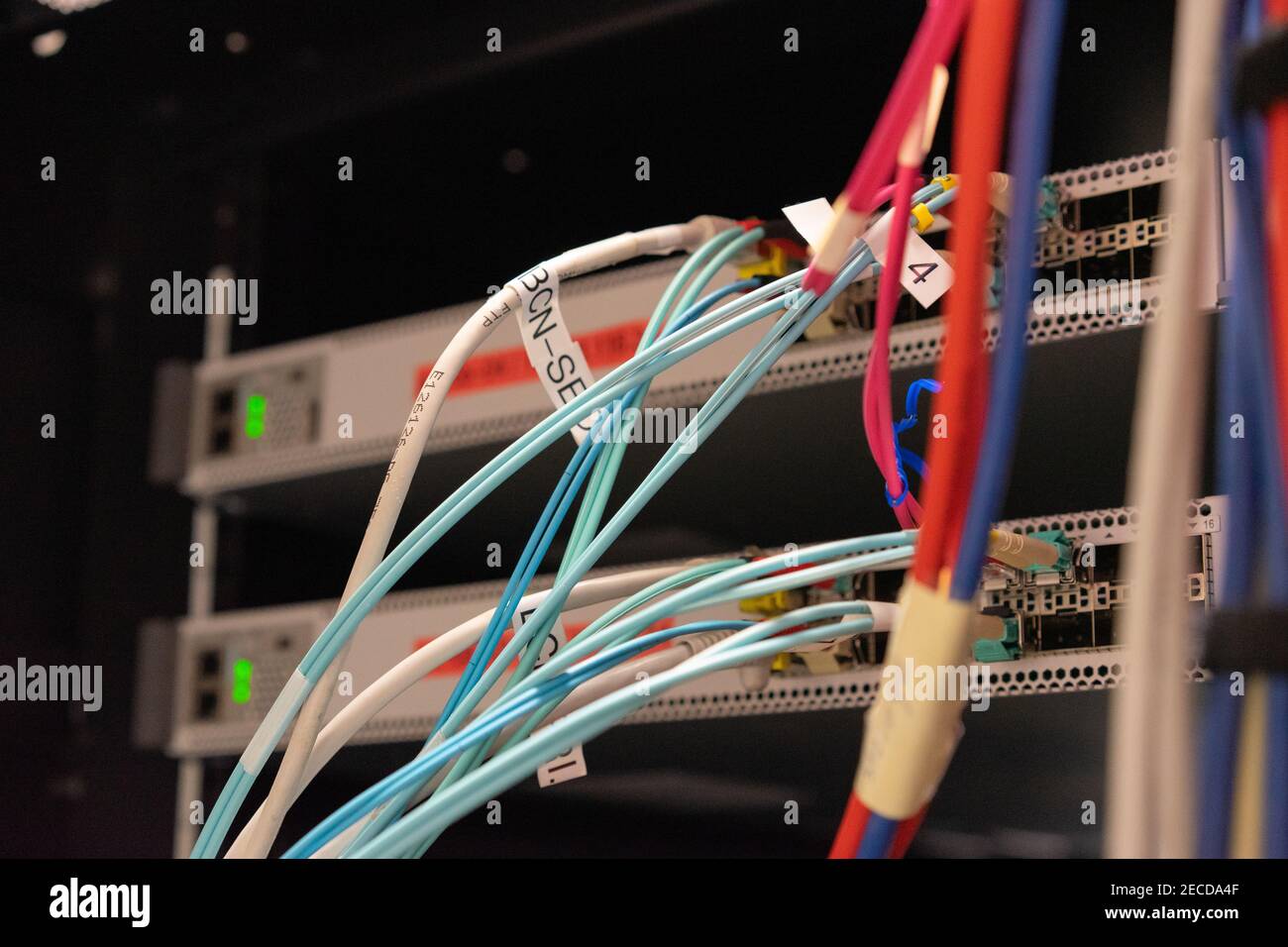Network cable and switch, data center in server room Stock Photo - Alamy