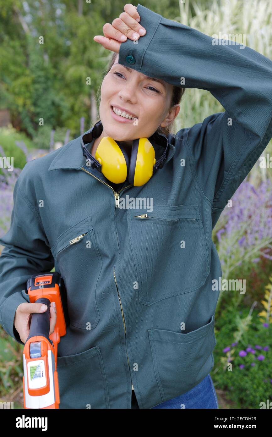 bored and tired female gardener Stock Photo - Alamy