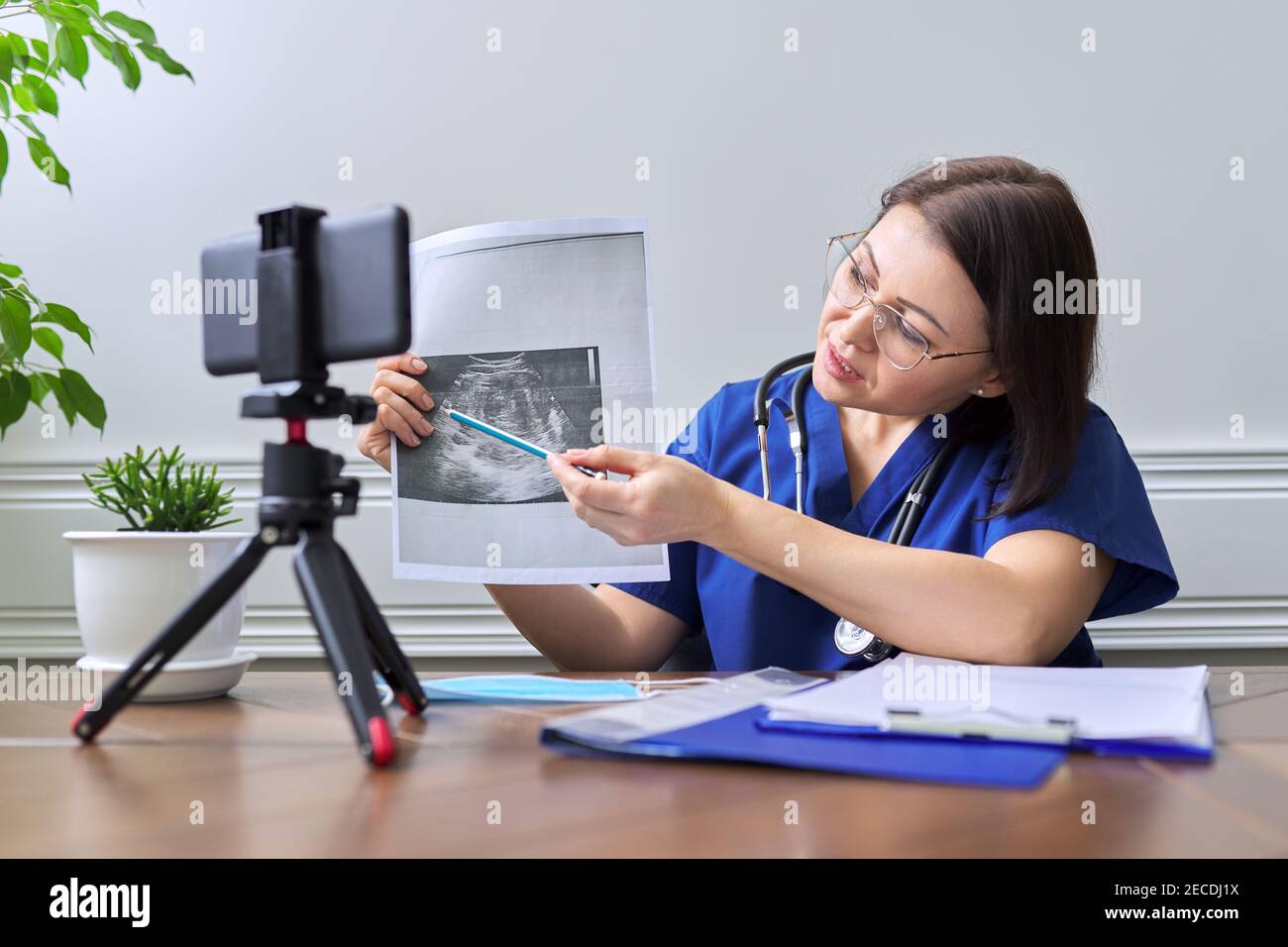 Video confident female doctor using hi-res stock photography and images ...