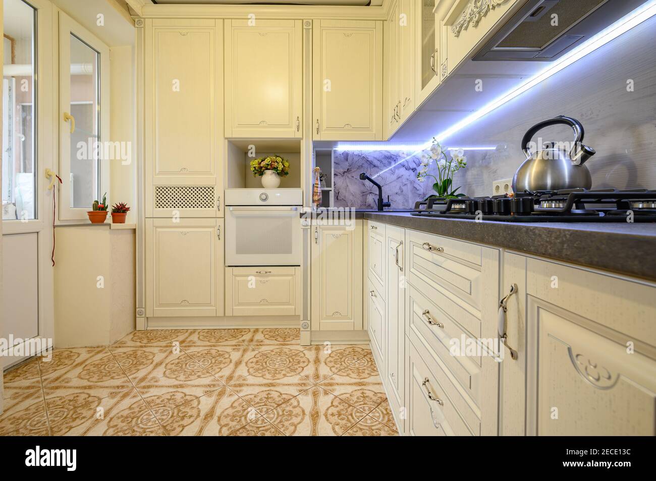 Luxury cream colored classic kitchen interior Stock Photo - Alamy