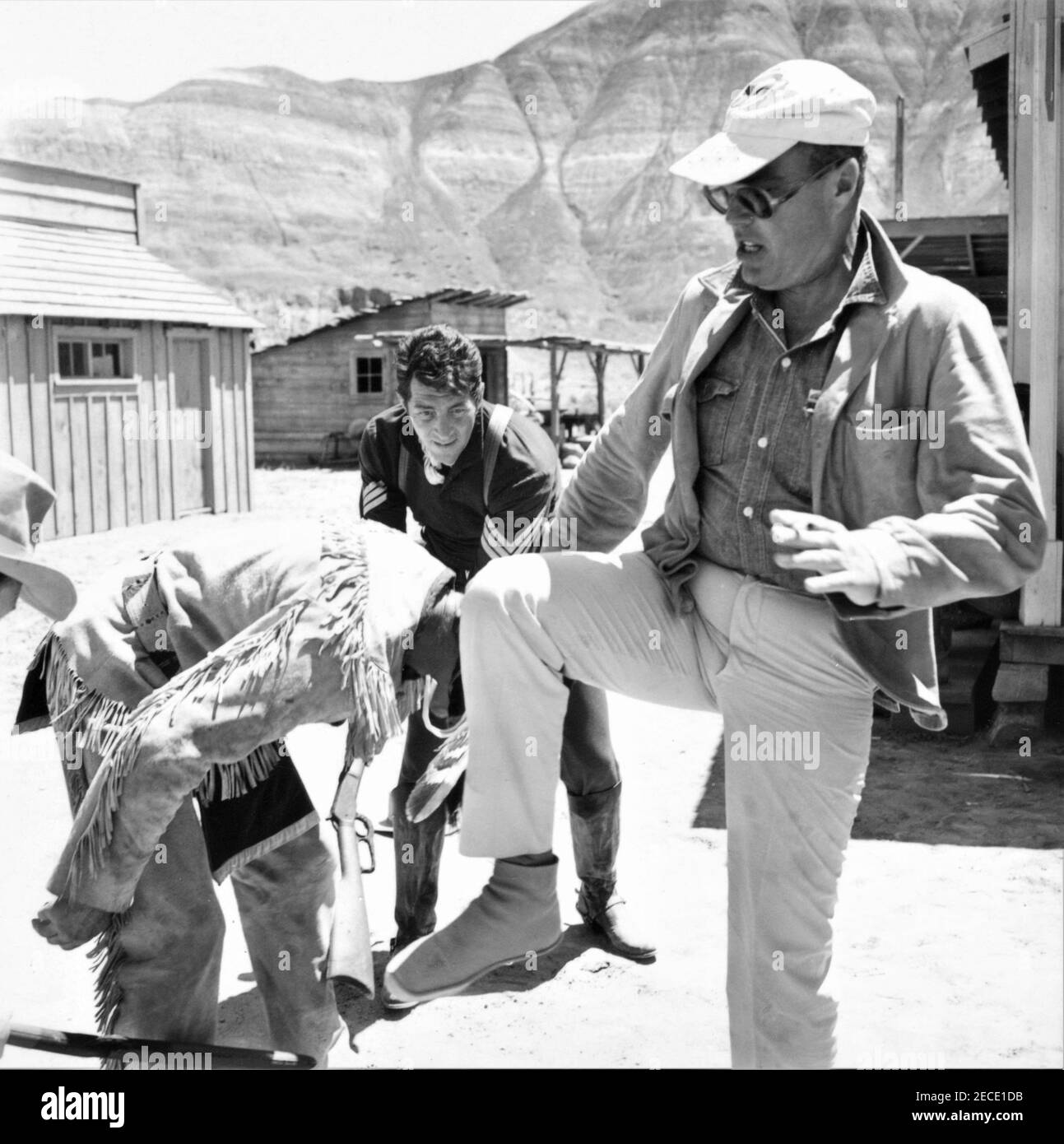 DEAN MARTIN rehearses a fight scene with Native American Indian and ...