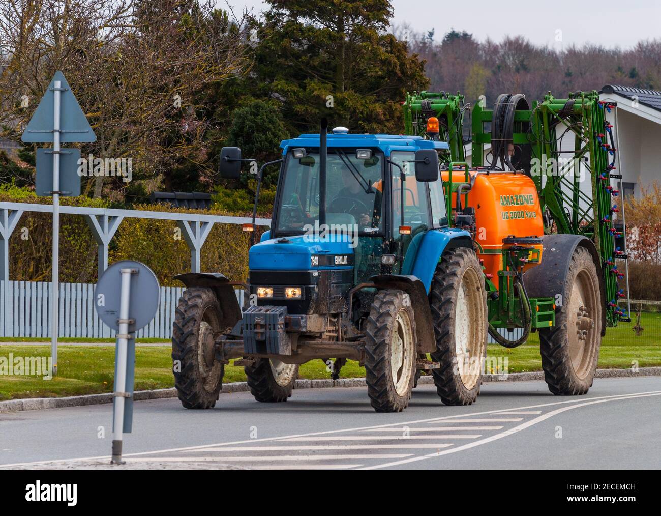 Blue and orange tractor hi-res stock photography and images - Alamy