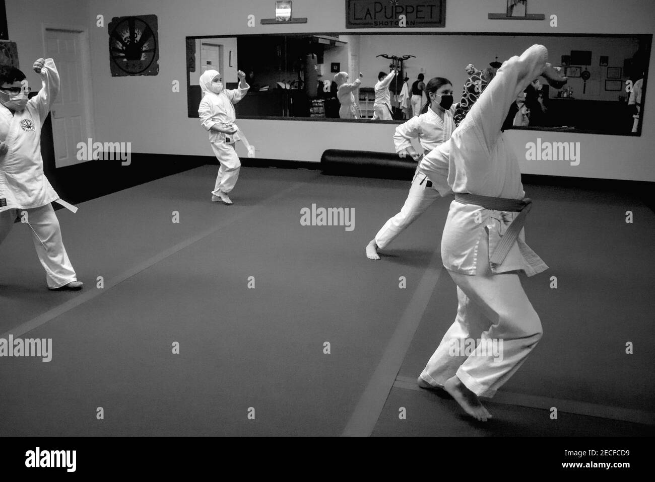 This action photo is of my daughter and her classmates in a Karate ...