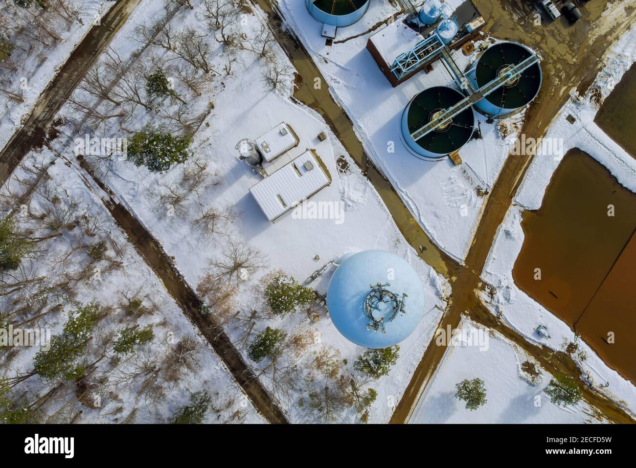 View of sewage treatment plant in winter season with sewage farm ...