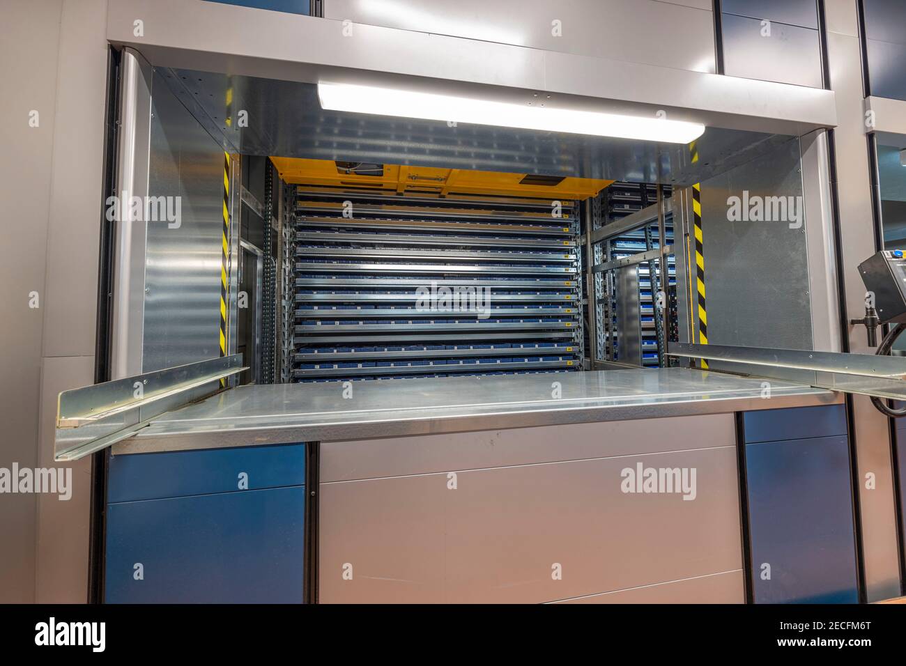 Automated storage system in the warehouse. Vertical carousel storage ...