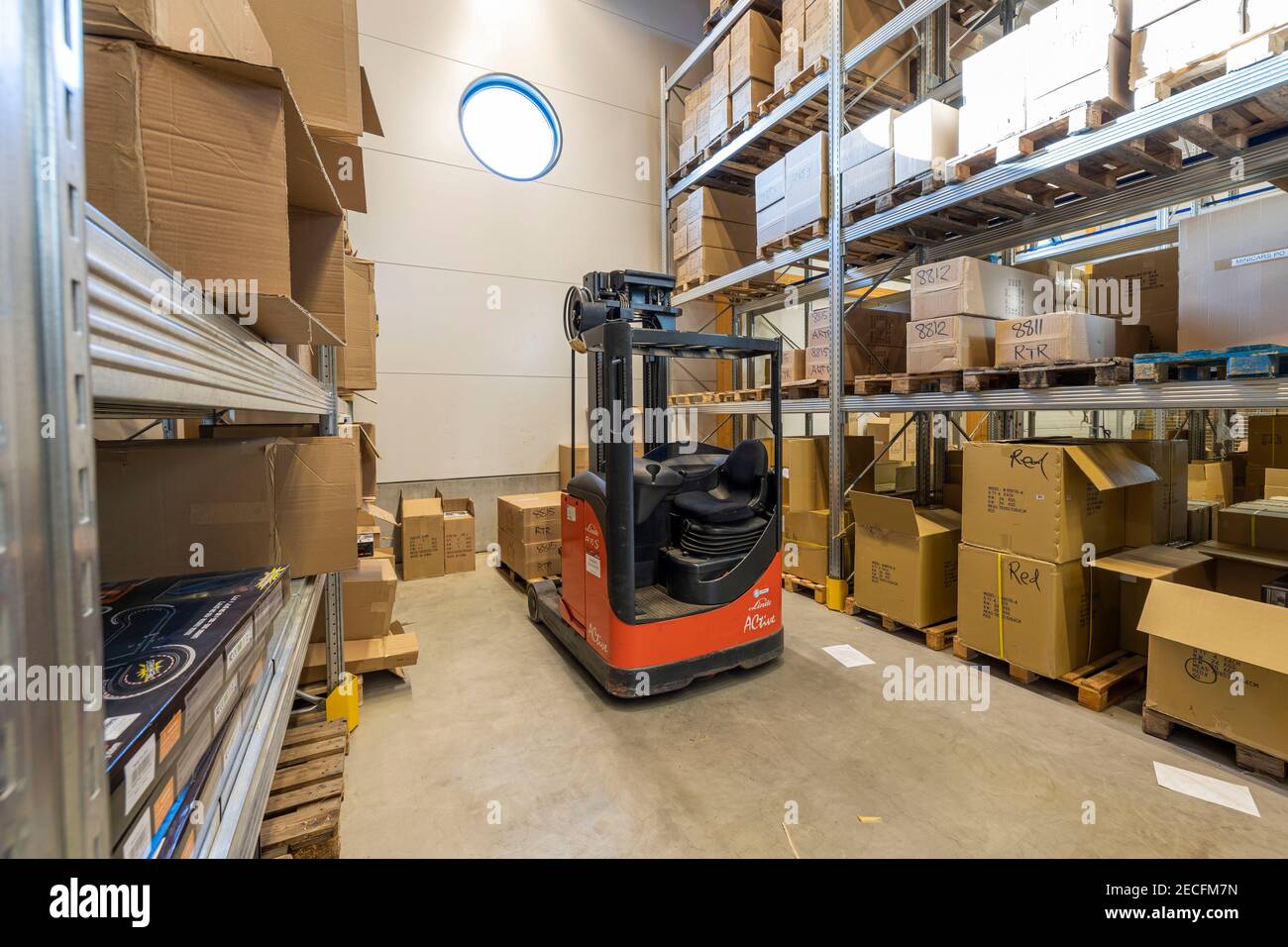 Close up view of storage warehouse. Fork lift truck in warehouse store ...