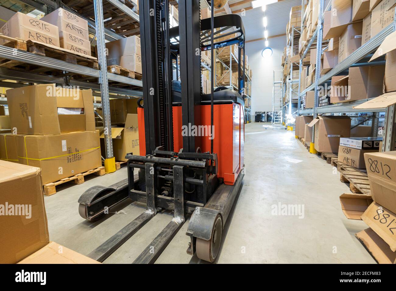 Close up view of storage warehouse. Fork lift truck in warehouse store ...