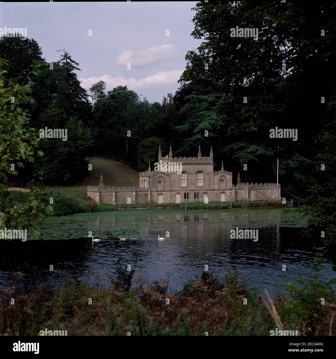 Exterior of grand gothic building on edge of lake Stock Photo - Alamy