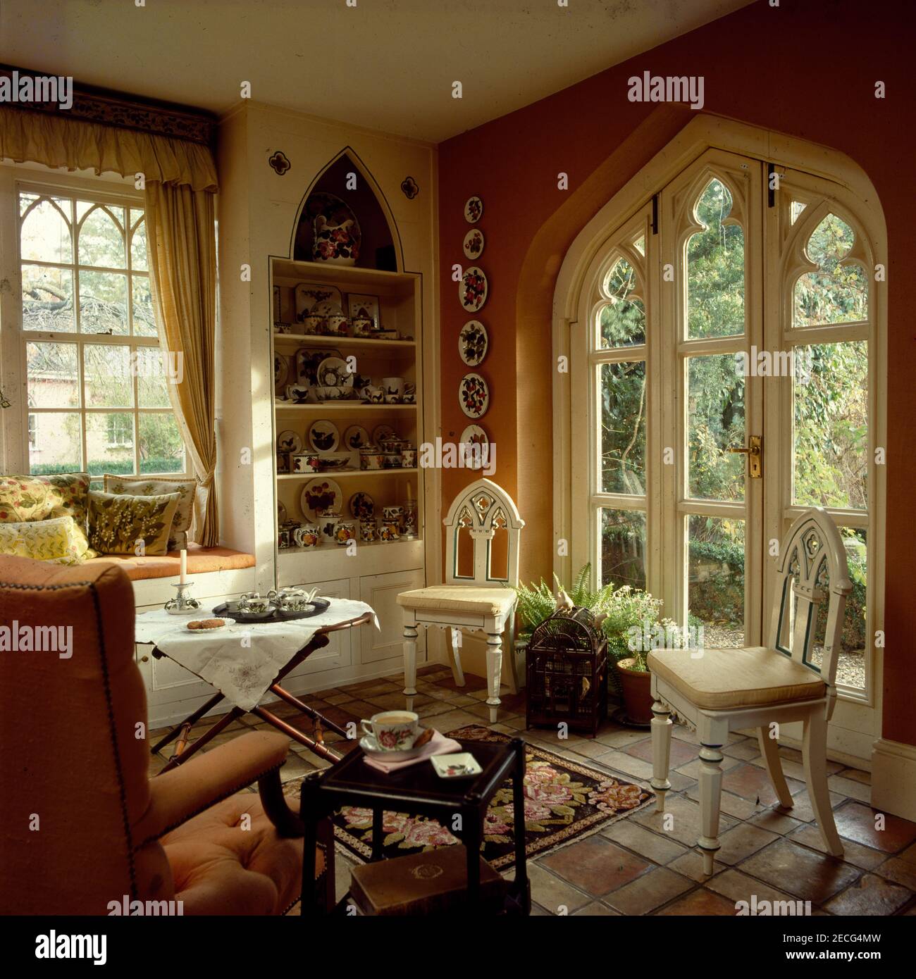 Gothic french windows leading from small sittingroom into garden Stock ...